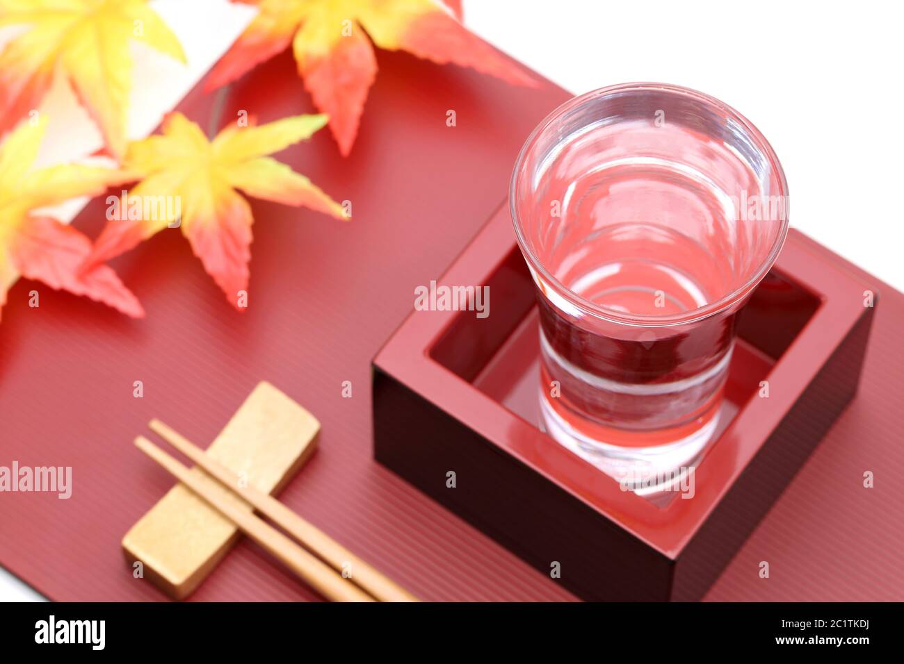 Japanese wooden box masu with sake on wooden tray, on white background ...