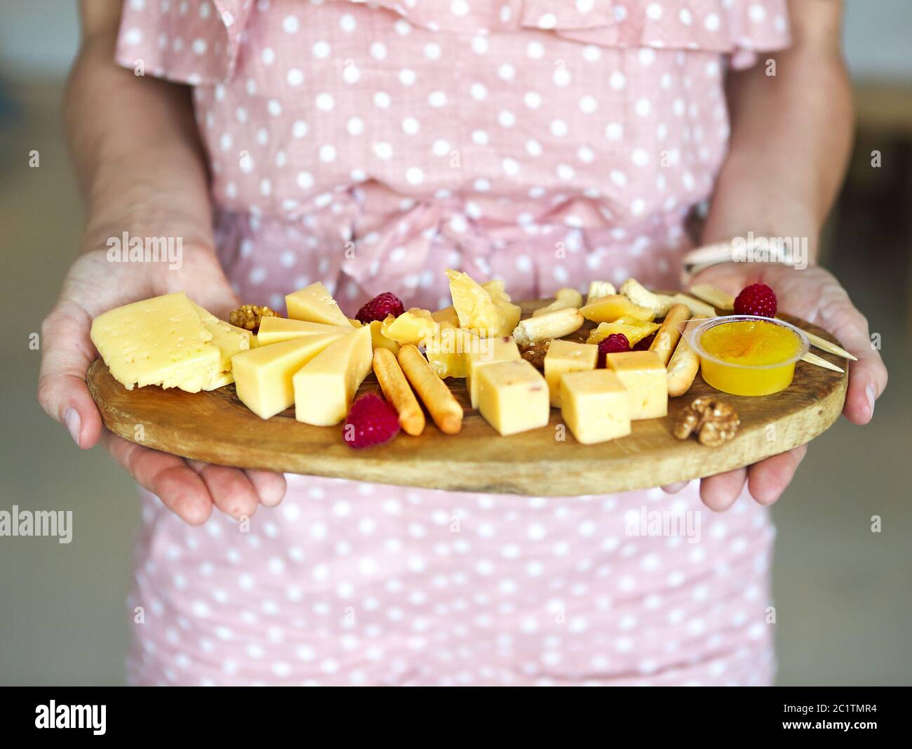 Woman cheese platter hi-res stock photography and images - Alamy