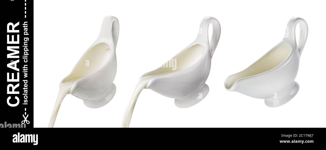 Pouring cream from creamer isolated on white background, flowing milk ...