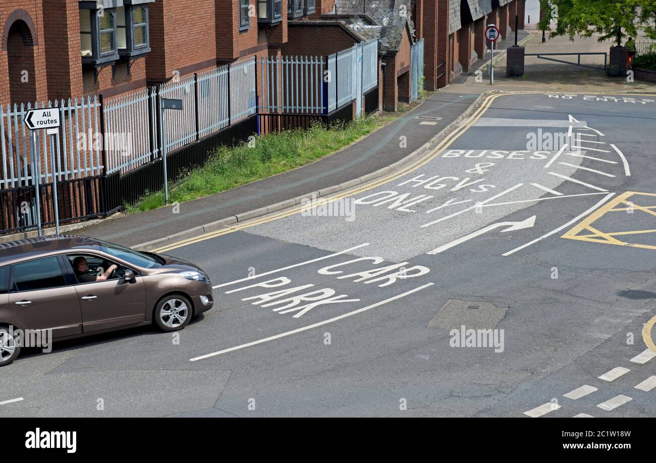Car at road junction, turning into car park, in Doncaster, South ...