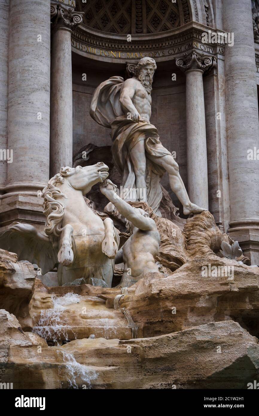 The statue of the god Neptune in the famous Trevi Fountain in Rome ...