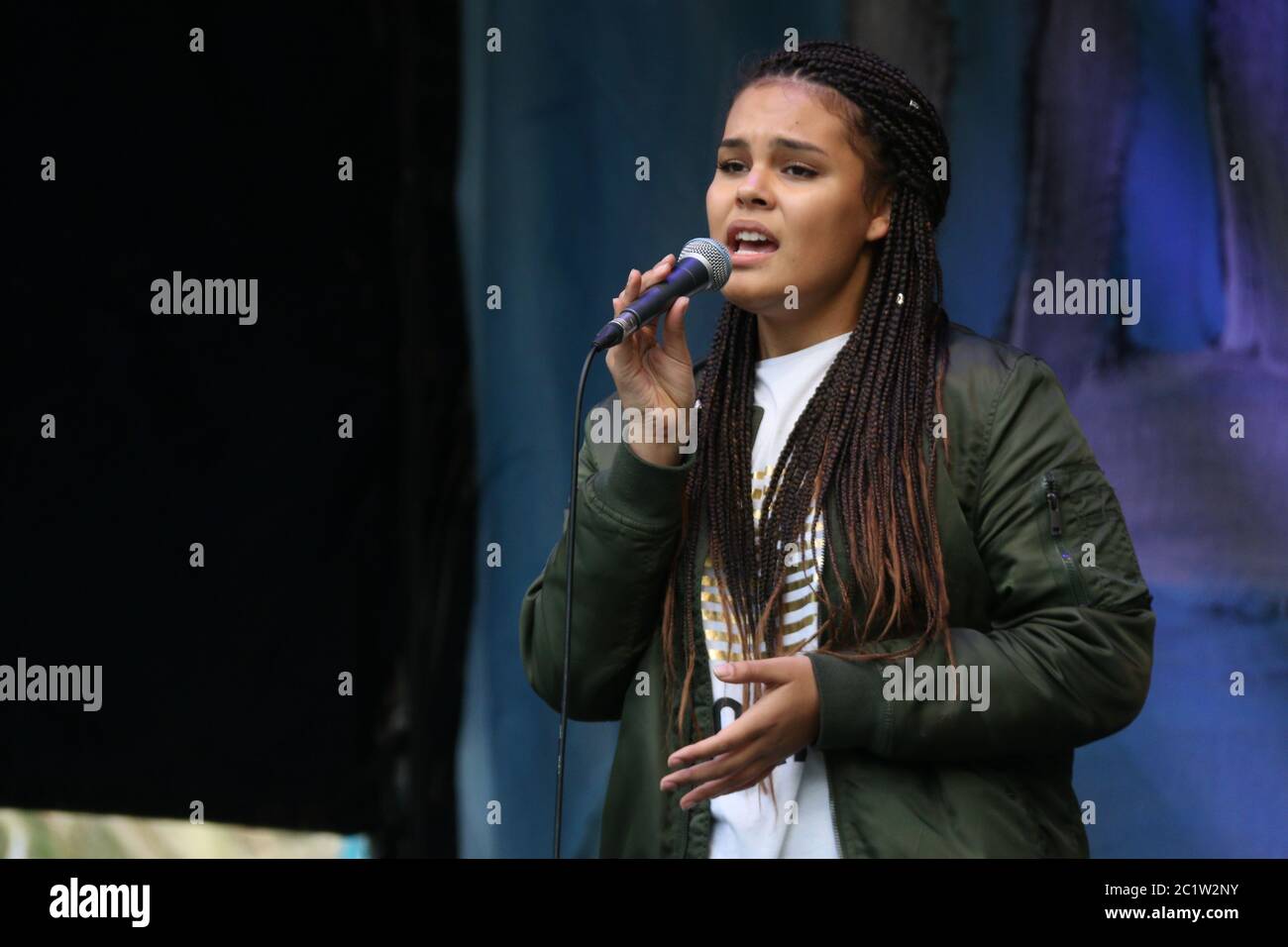 Pictured: Singer/songwriter Mi-kaisha performs on stage Stock Photo - Alamy