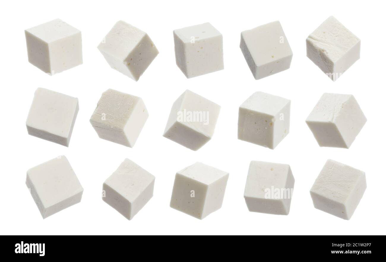 Greek feta cubes. Diced soft cheese isolated on white background Stock ...