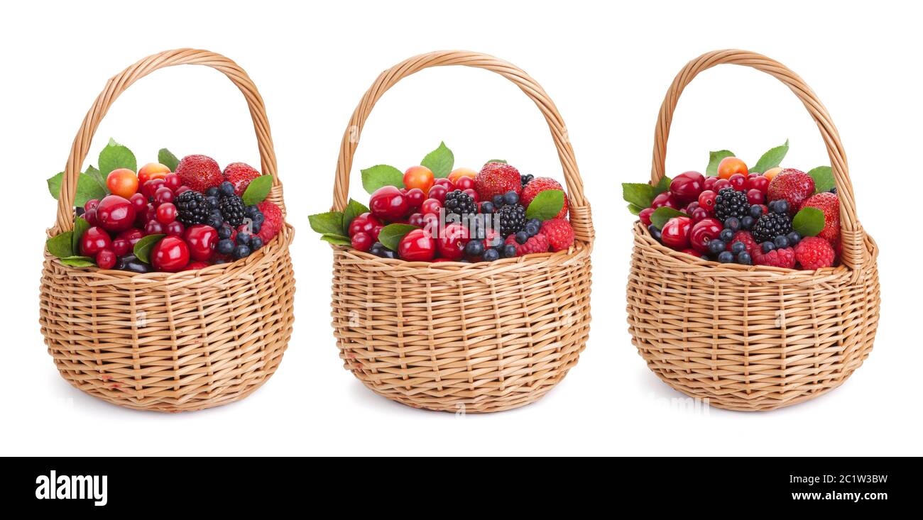 Fresh forest berries in basket isolated on white background with ...