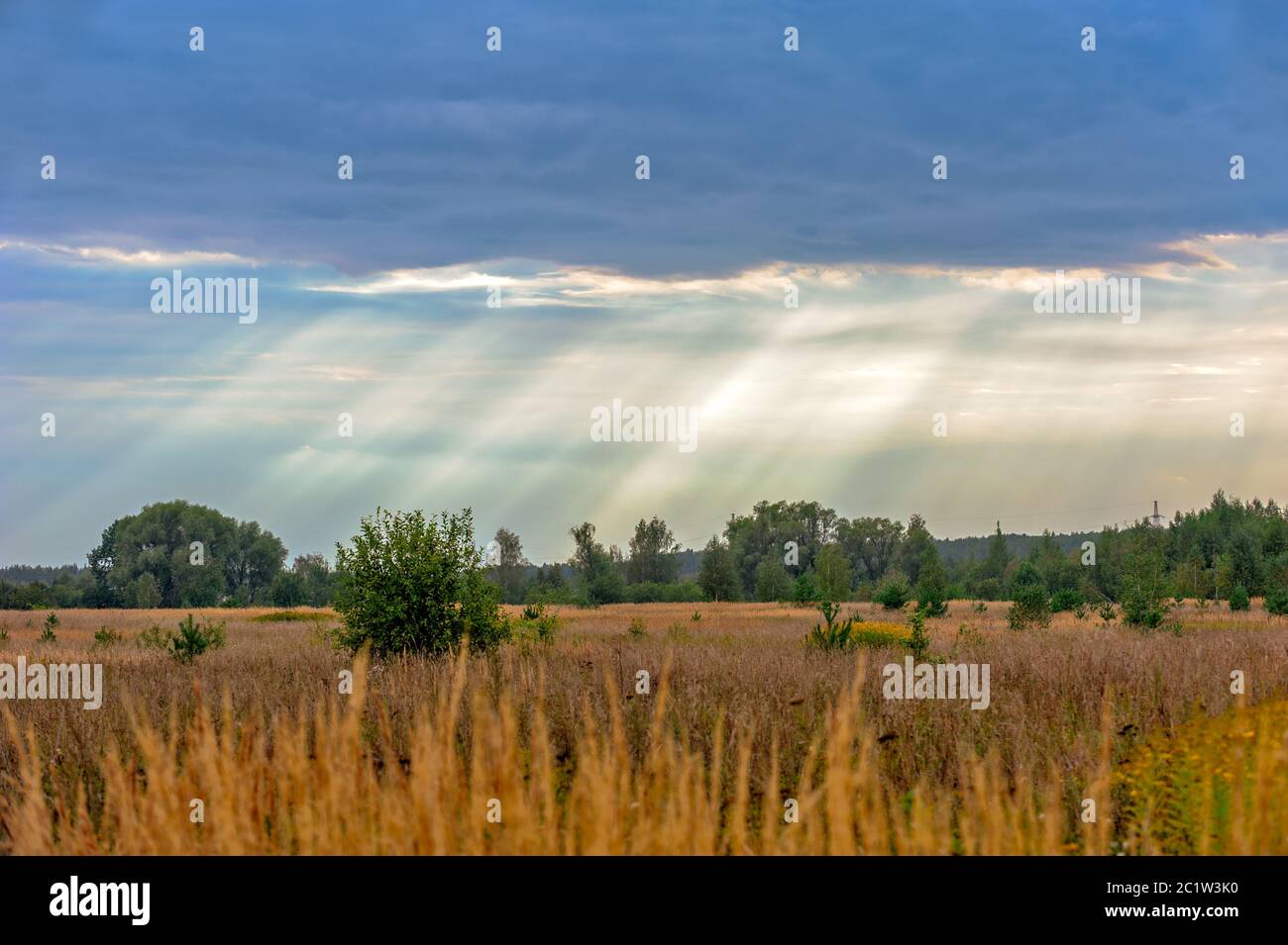 Sun rays through clouds hi-res stock photography and images - Alamy