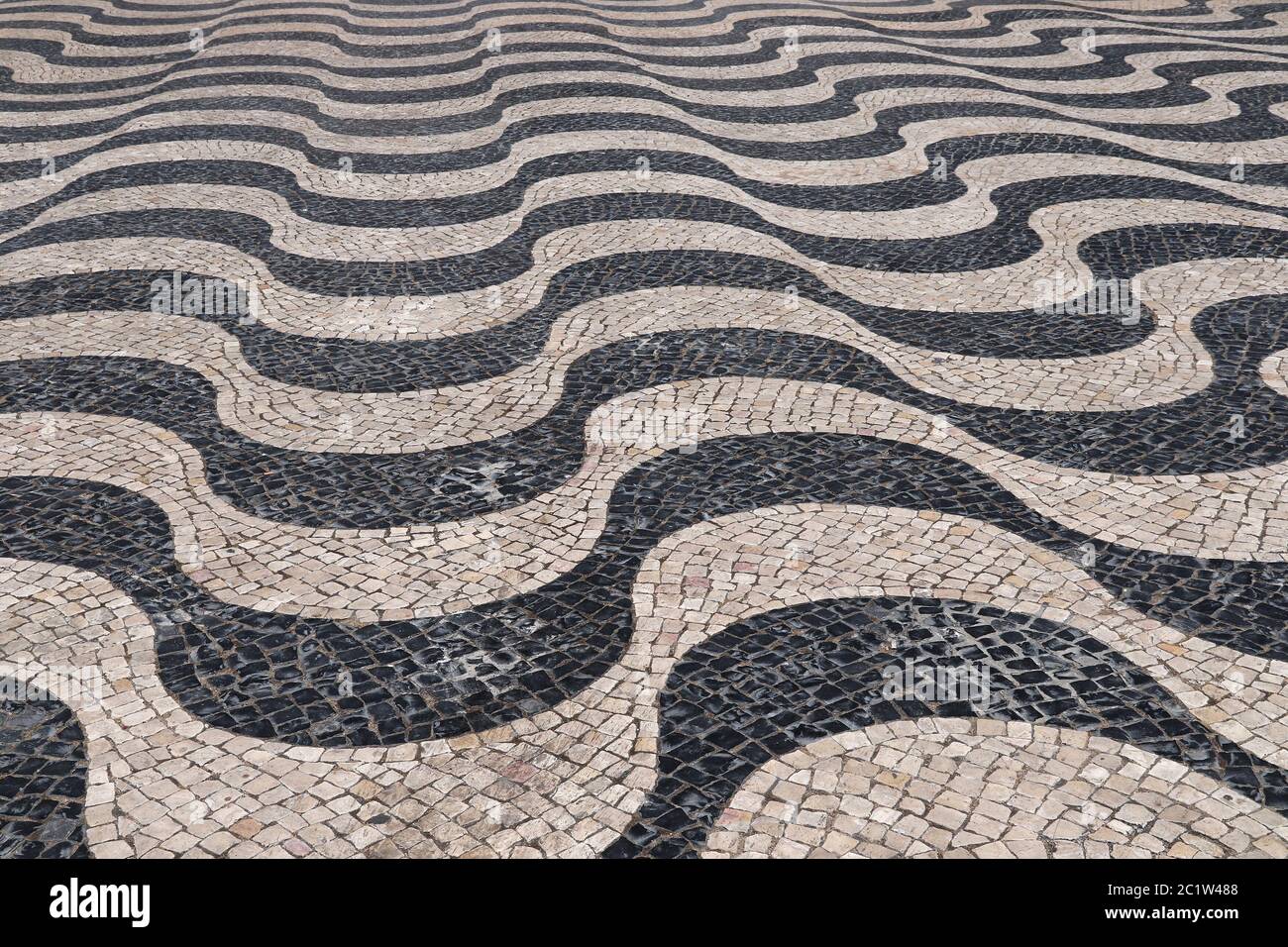 Cascais, Portugal. Wave patterns on stone paved city square Stock Photo ...