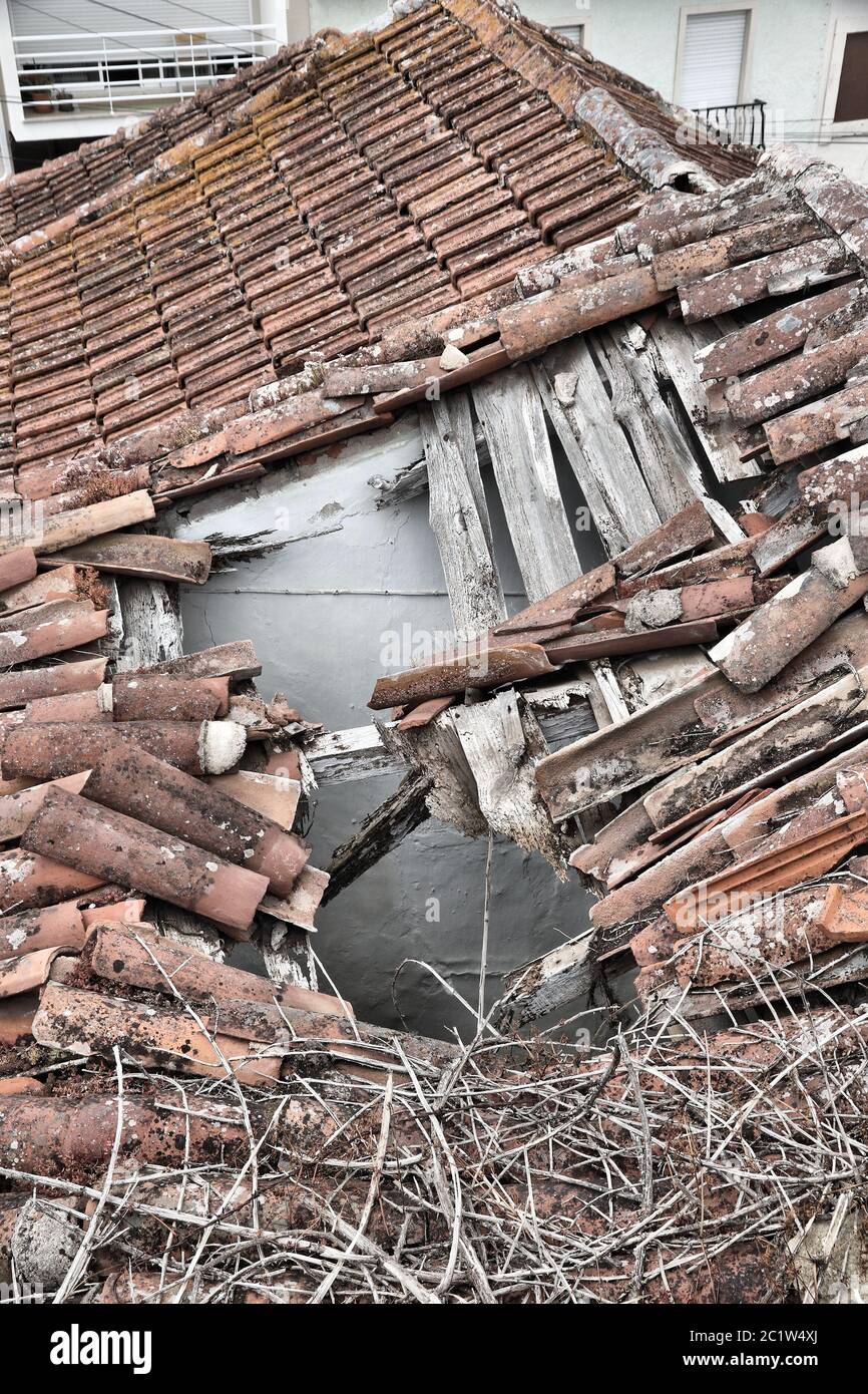 Collapsed roof tiles hi-res stock photography and images - Alamy