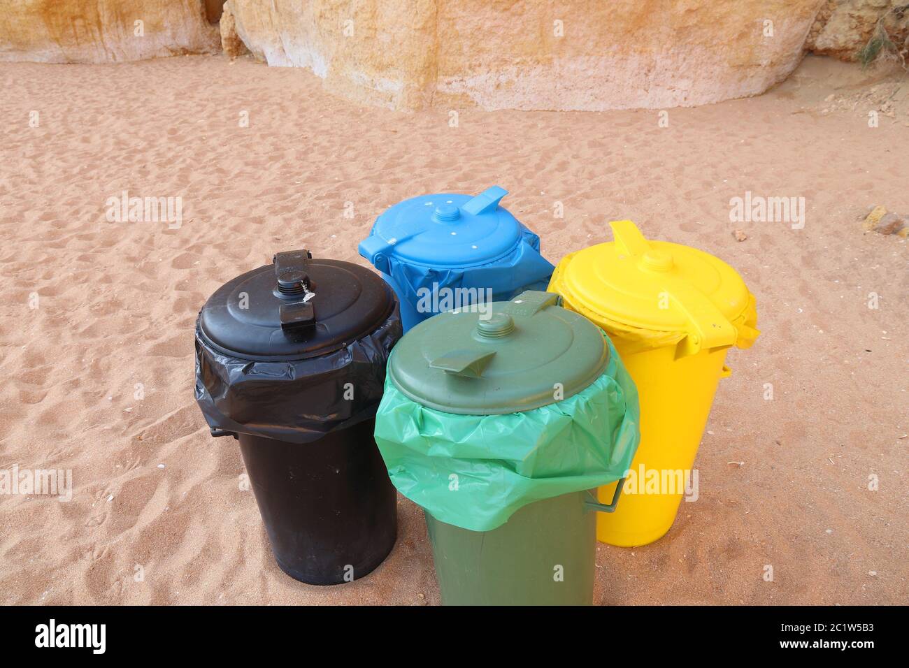 Waste sorting containers at a public beach in Algarve, Portugal ...