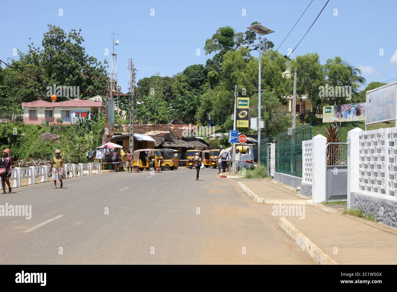 Road traffic control ramp at the entrance of Andoany or Hell-Ville ...