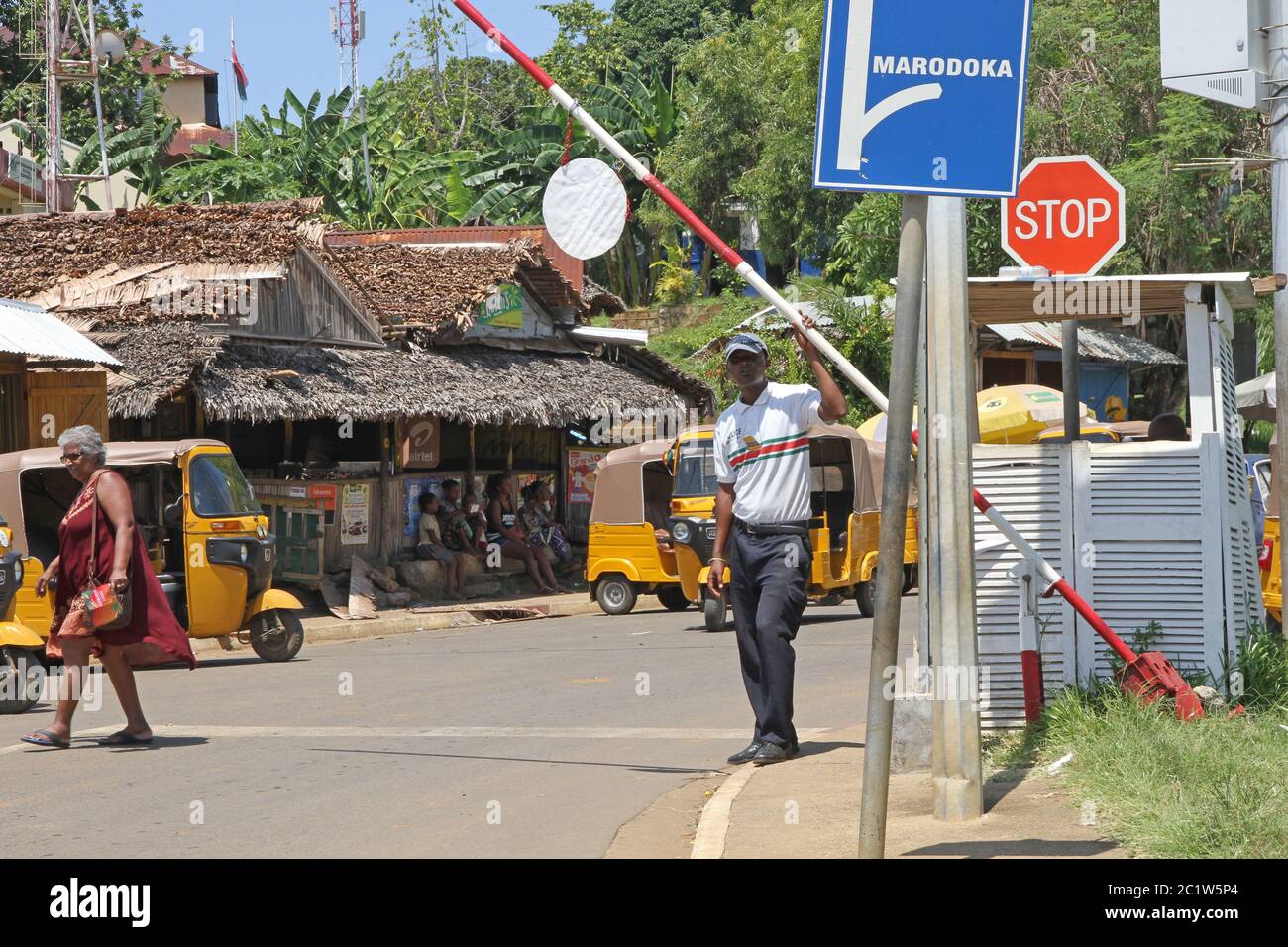 Road traffic control ramp at the entrance of Andoany or Hell-Ville ...