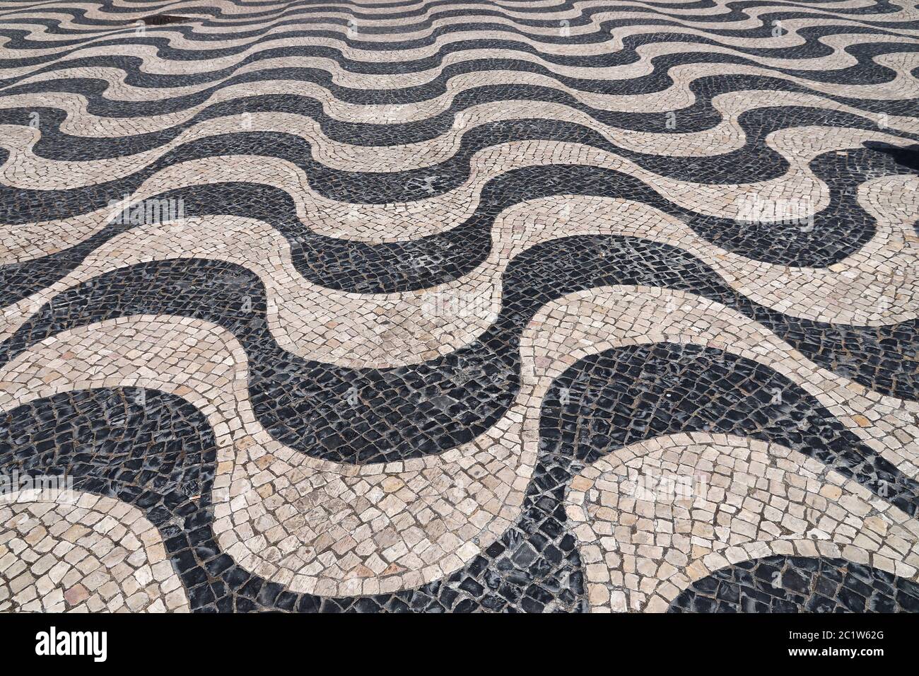 Cascais, Portugal. Wave patterns on stone paved city square Stock Photo ...