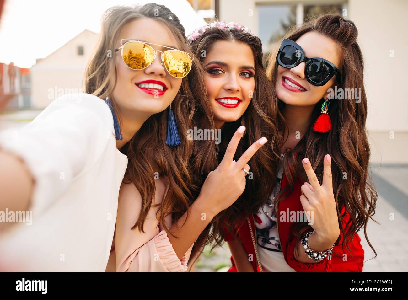 Portrait girl showing peace sign hi-res stock photography and images ...
