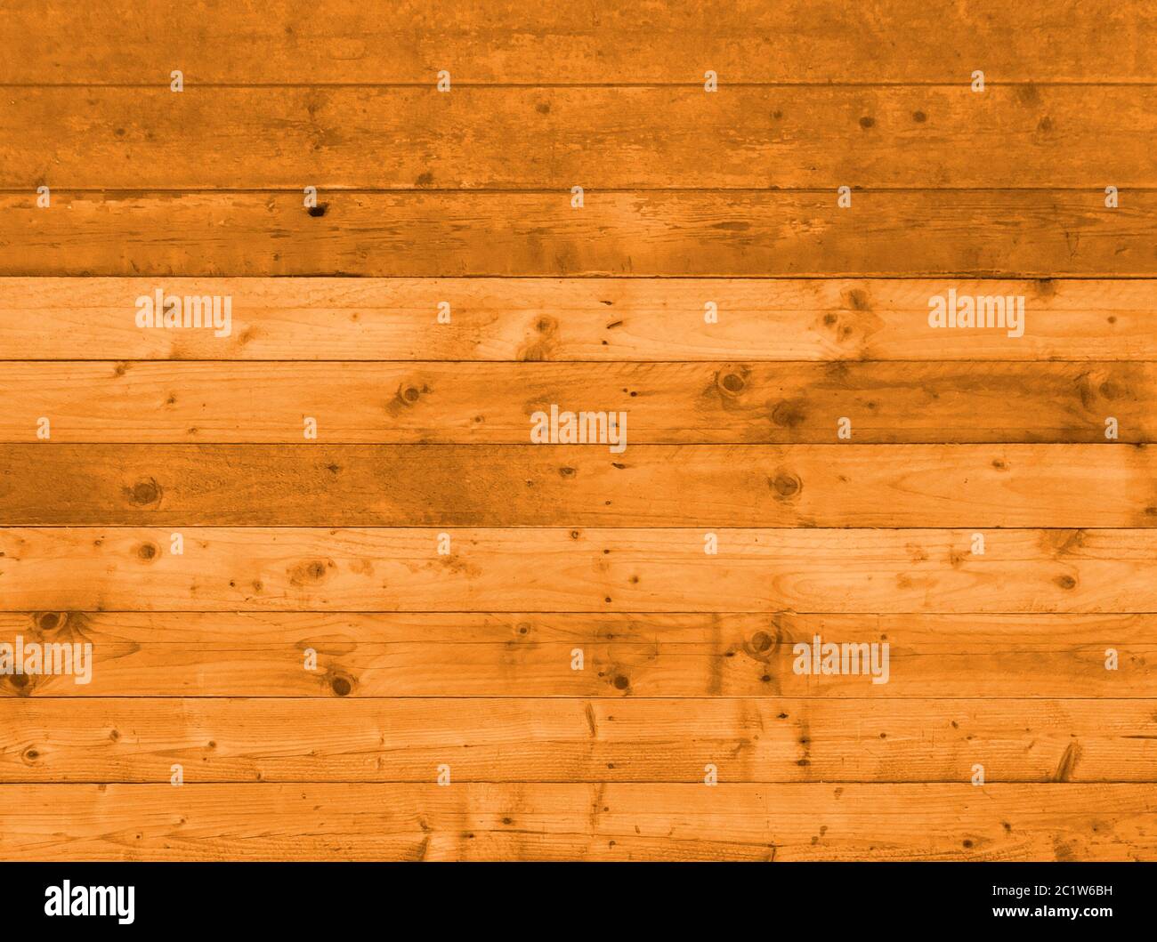 warm brown wooden plank wall or floor with grainy knotted boards made ...