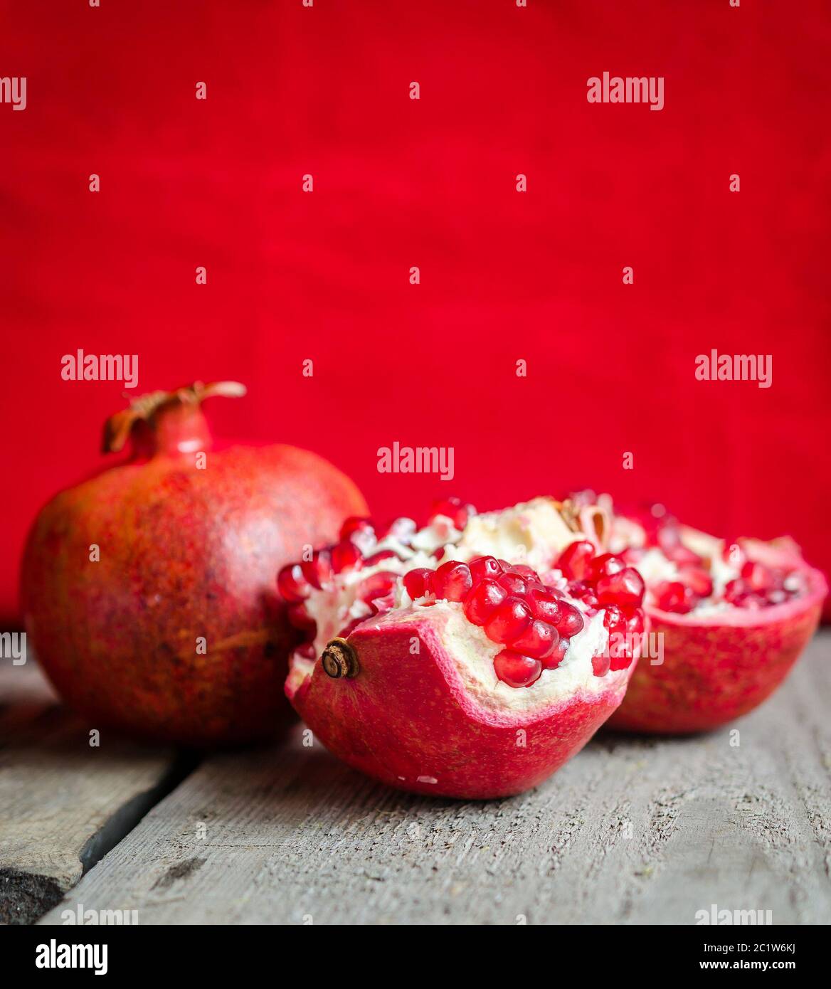 Cut half pomegranate cross section hi-res stock photography and images ...