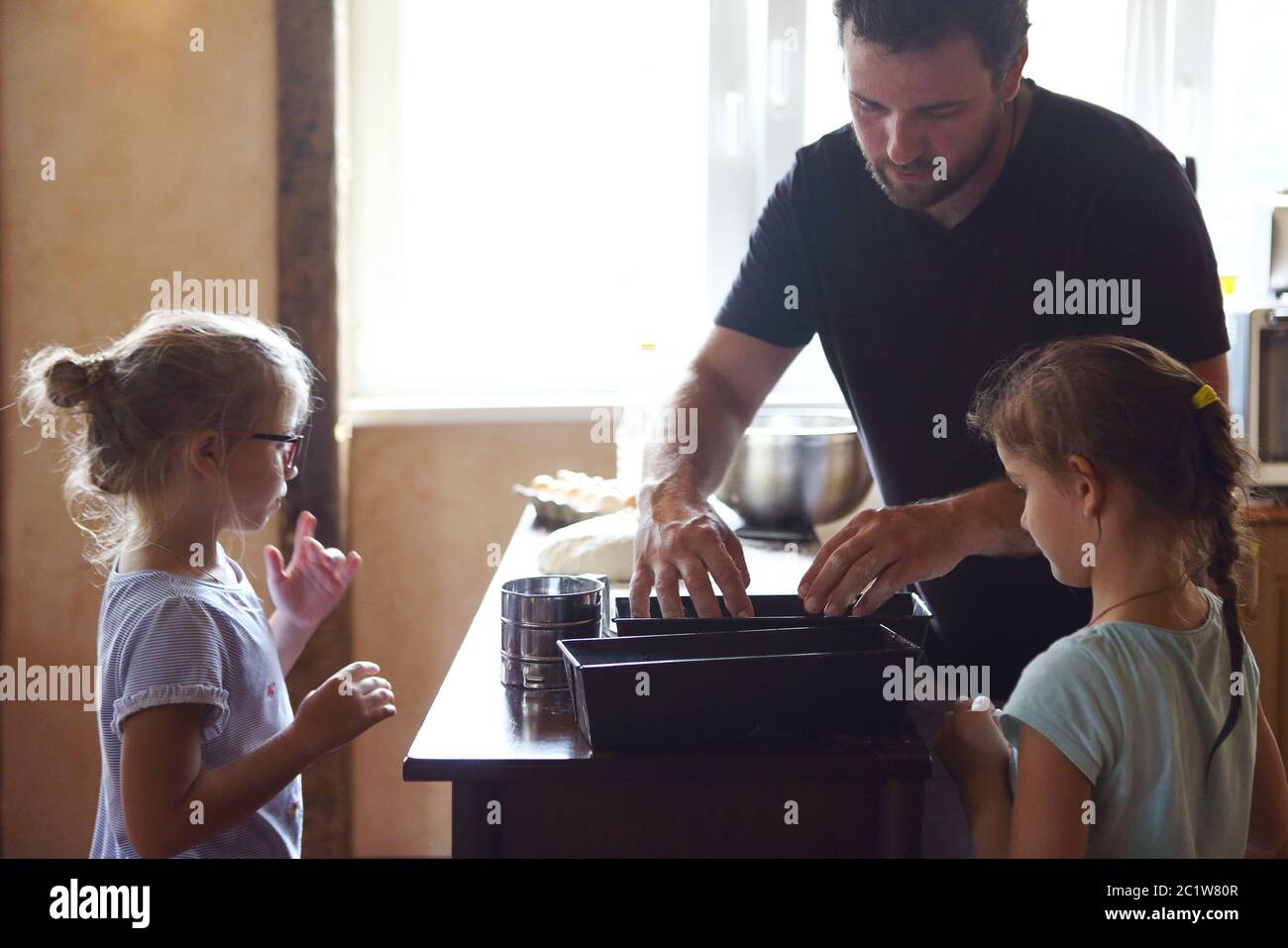Children cooking homemade bread with there father Stock Photo - Alamy