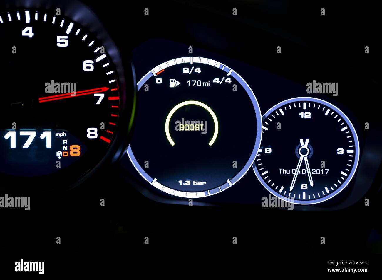 Modern light car mileage on black background Stock Photo - Alamy