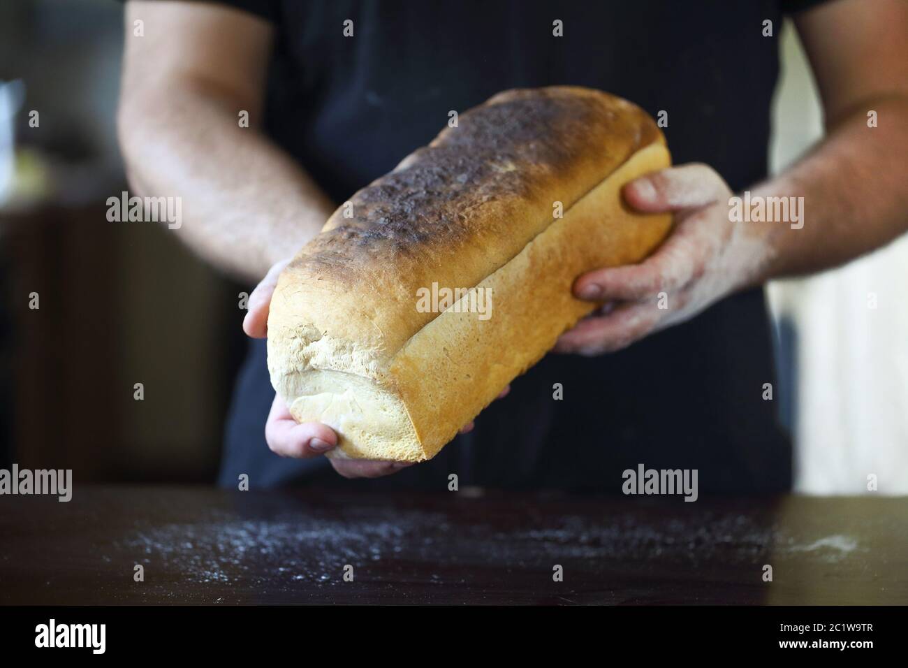 Senior man holding homemade bread hi-res stock photography and images ...