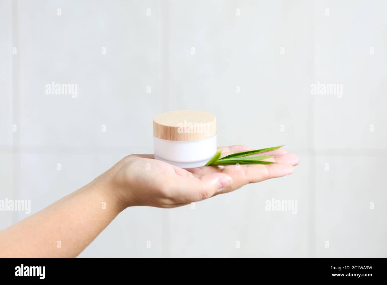 Holding bamboo stem hi-res stock photography and images - Alamy