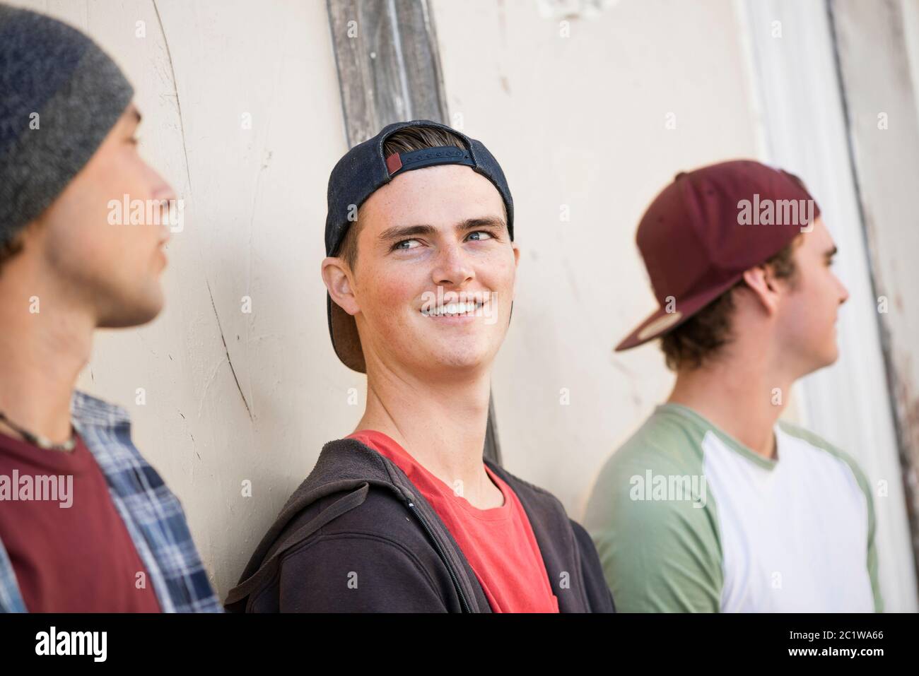 Three guys walking together in hi-res stock photography and images - Alamy