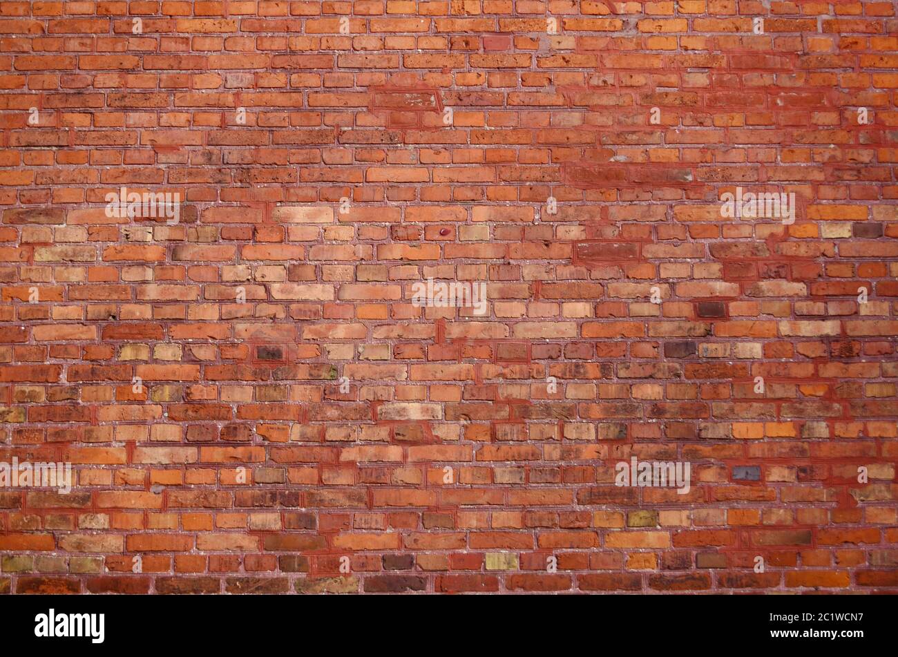 Old brick wall with red building blocks and background Stock Photo - Alamy