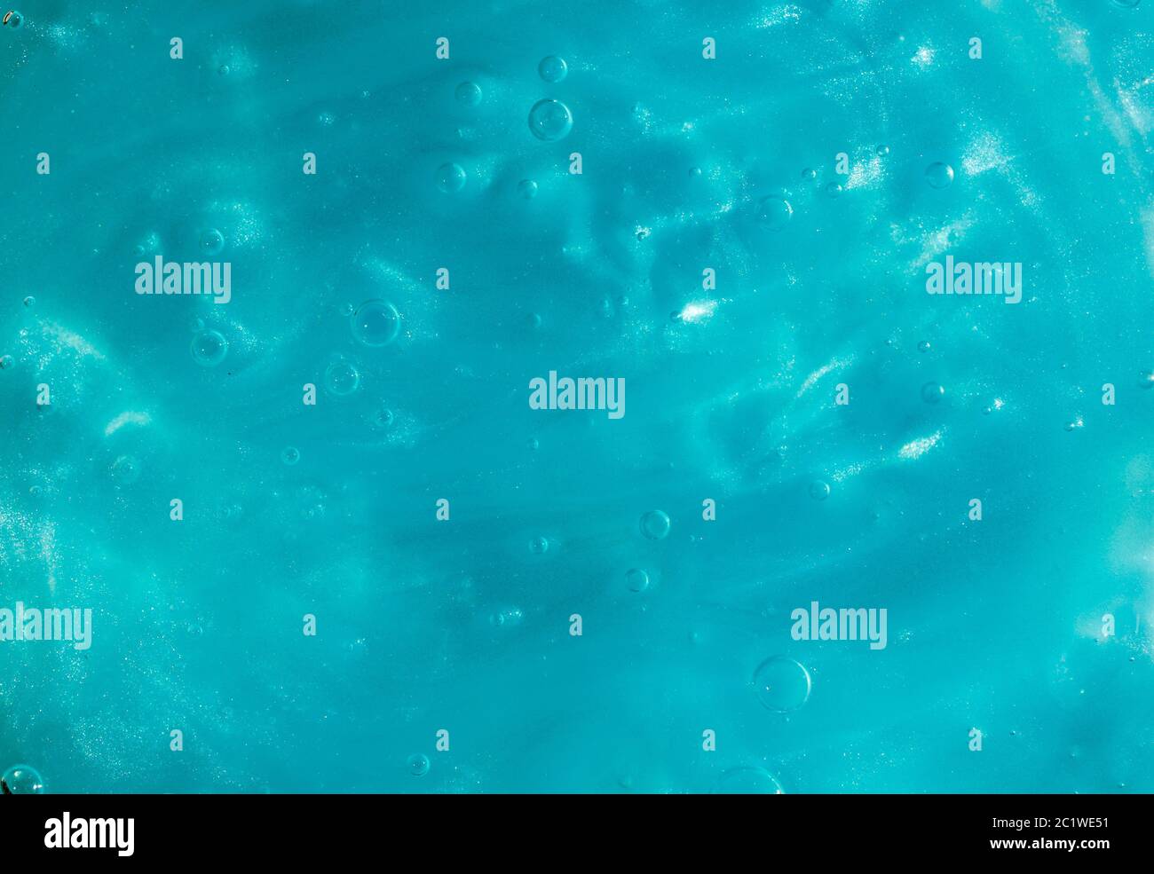 Blue liquid with bubbles background Stock Photo - Alamy