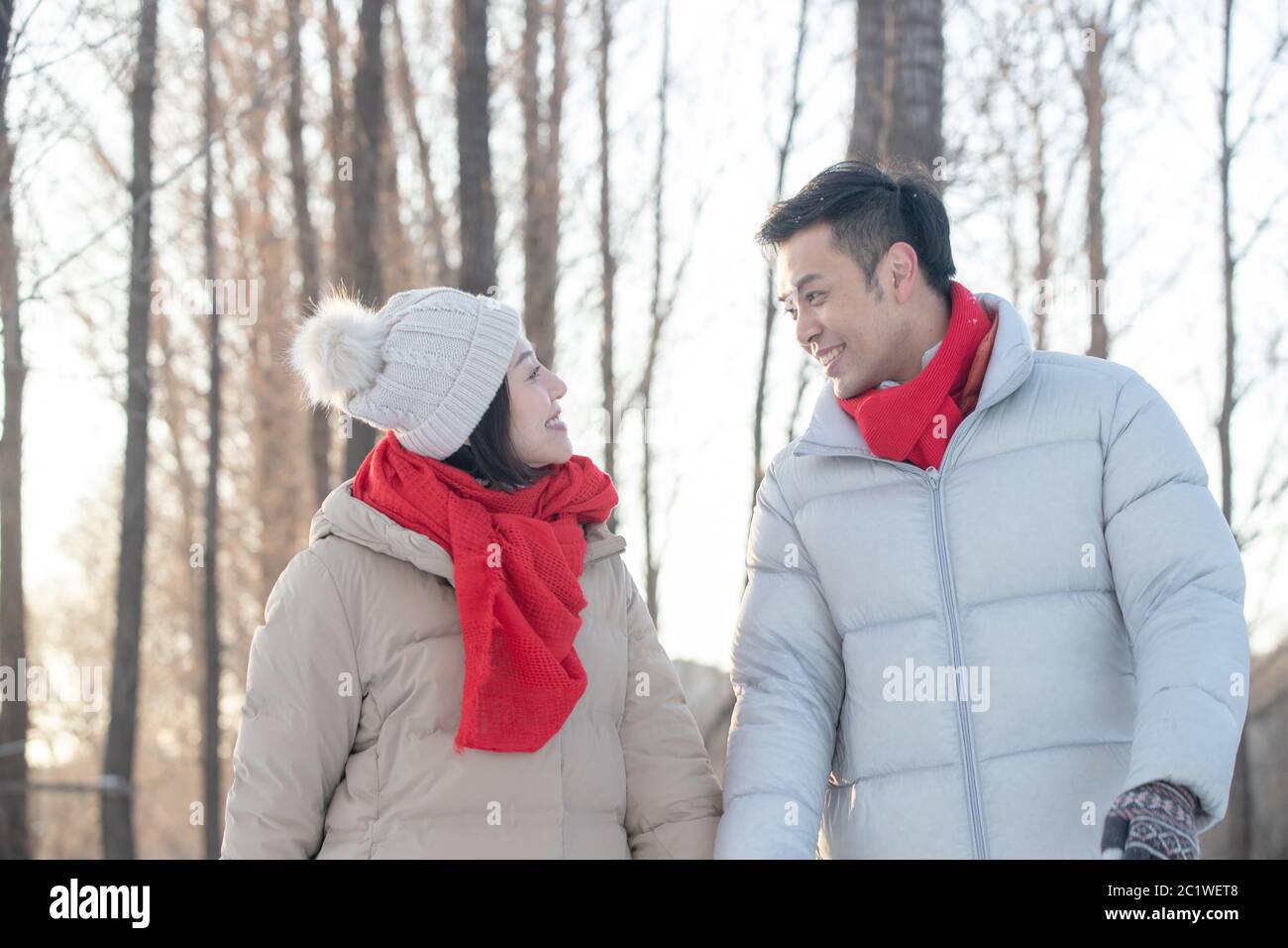 Young couple outside for a walk Stock Photo - Alamy