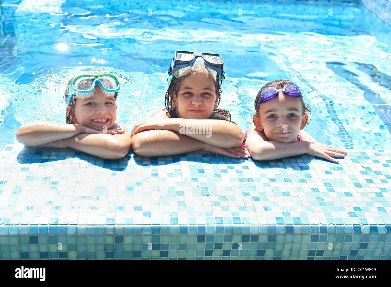 Three girls playing outdoor hi-res stock photography and images - Alamy