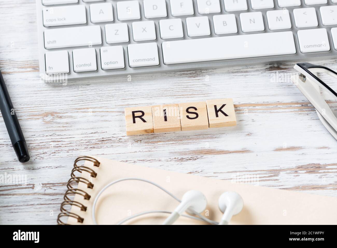 Risk management concept with letters on cubes Stock Photo - Alamy