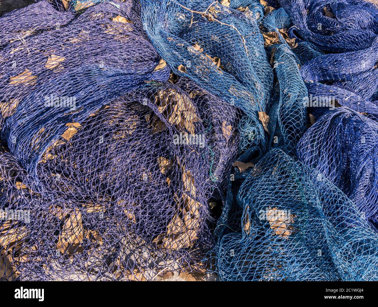 Blue fishing nets hi-res stock photography and images - Alamy