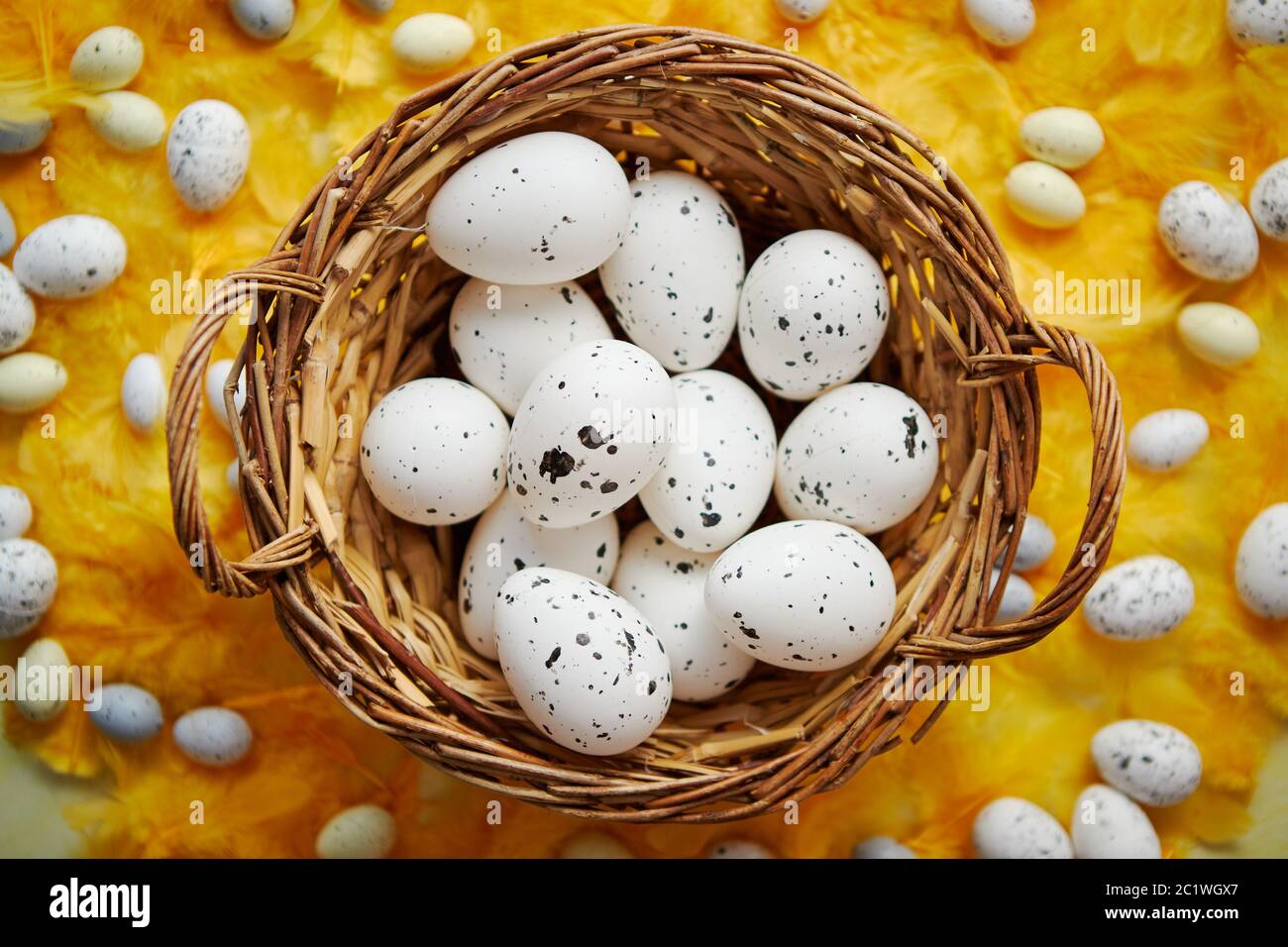 Easter holidays concept. White dotted chicken Eggs in the wicker Stock ...