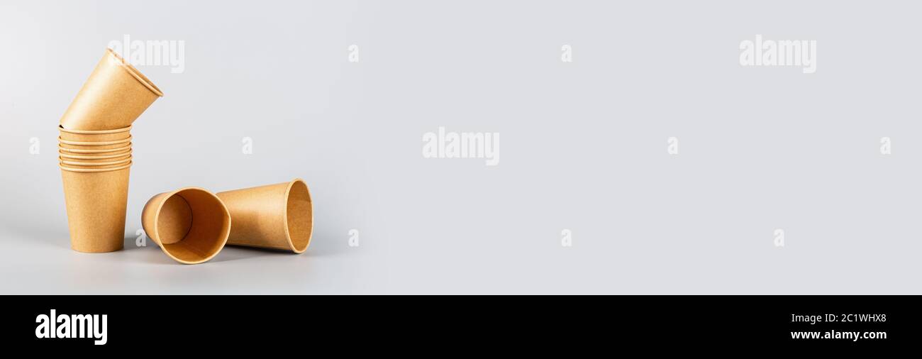 eco natural paper cups on gray background. sustainable lifestyle ...