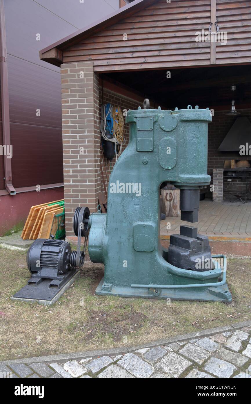 Retro industrial metalworking machine outside the factory Stock Photo ...