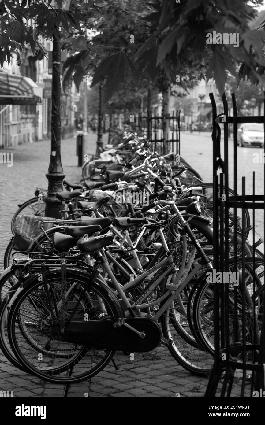European bicycles in a city parked up Stock Photo - Alamy