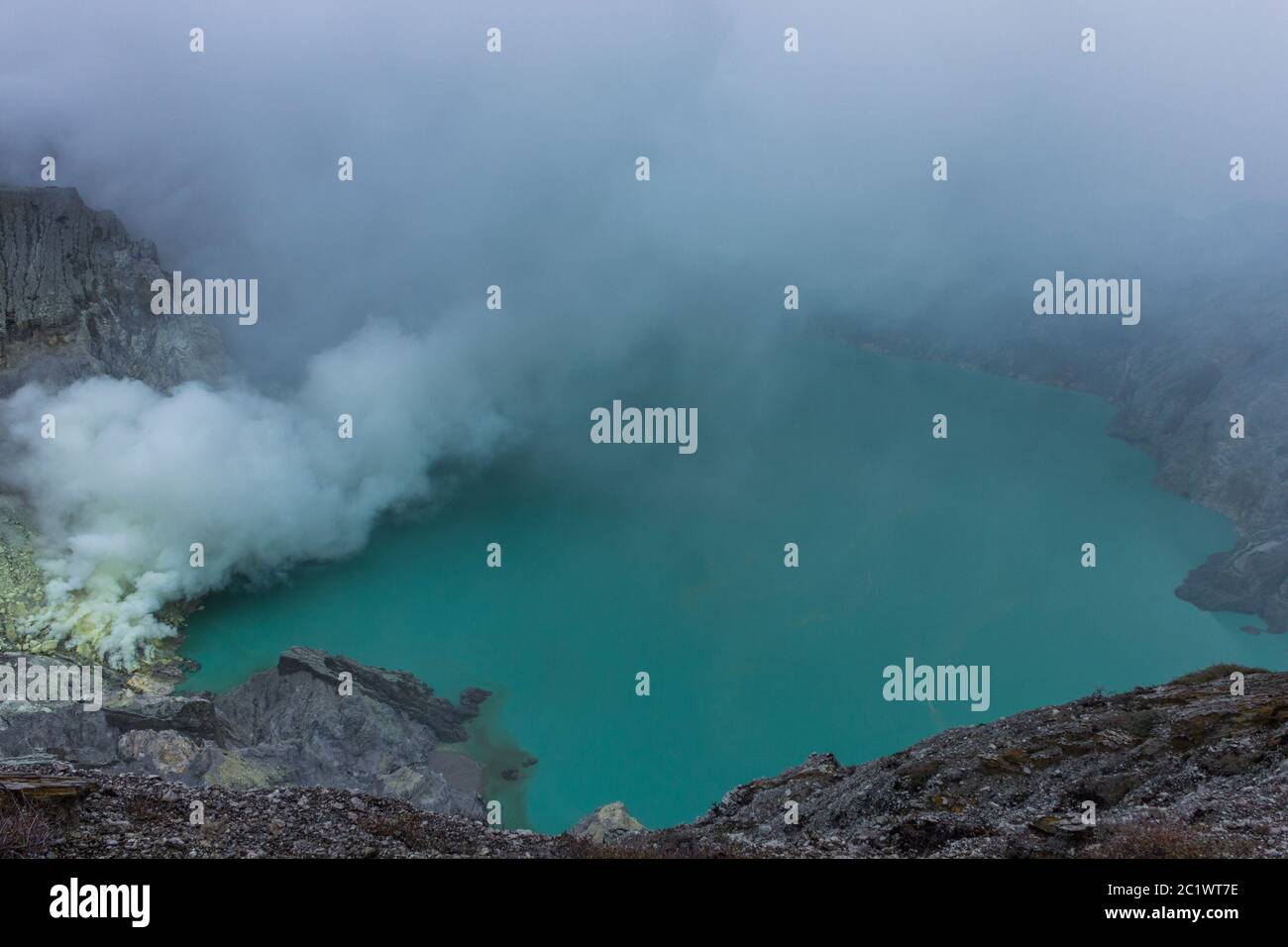 Blue lake on the caldera of Ijen crater, Ijen Mountain, Banyuwangi ...