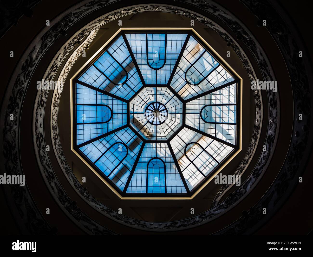 Monumental canopy of the famous spiral staircase of the Vatican in Rome ...
