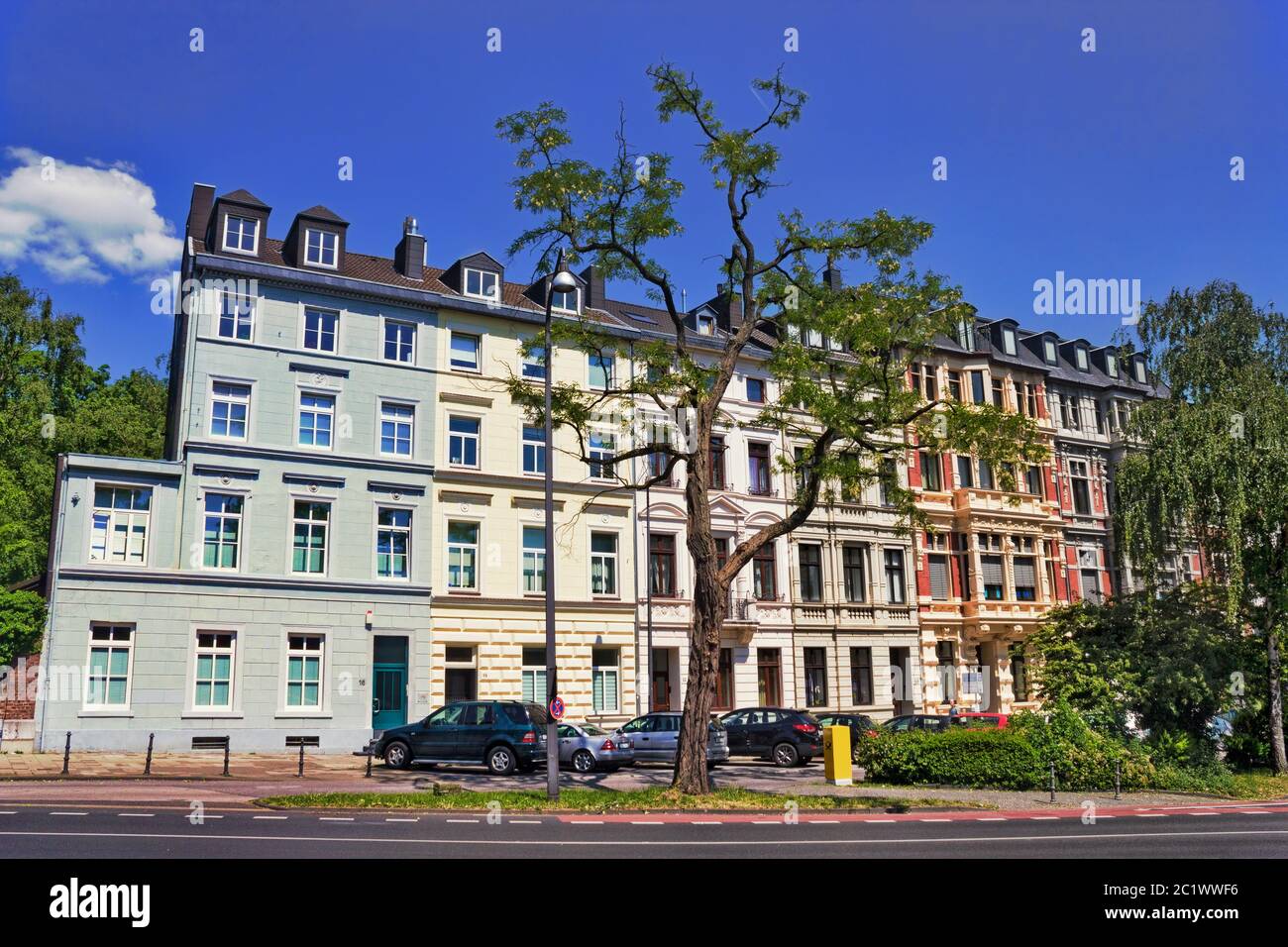 Renovated row of houses Stock Photo - Alamy