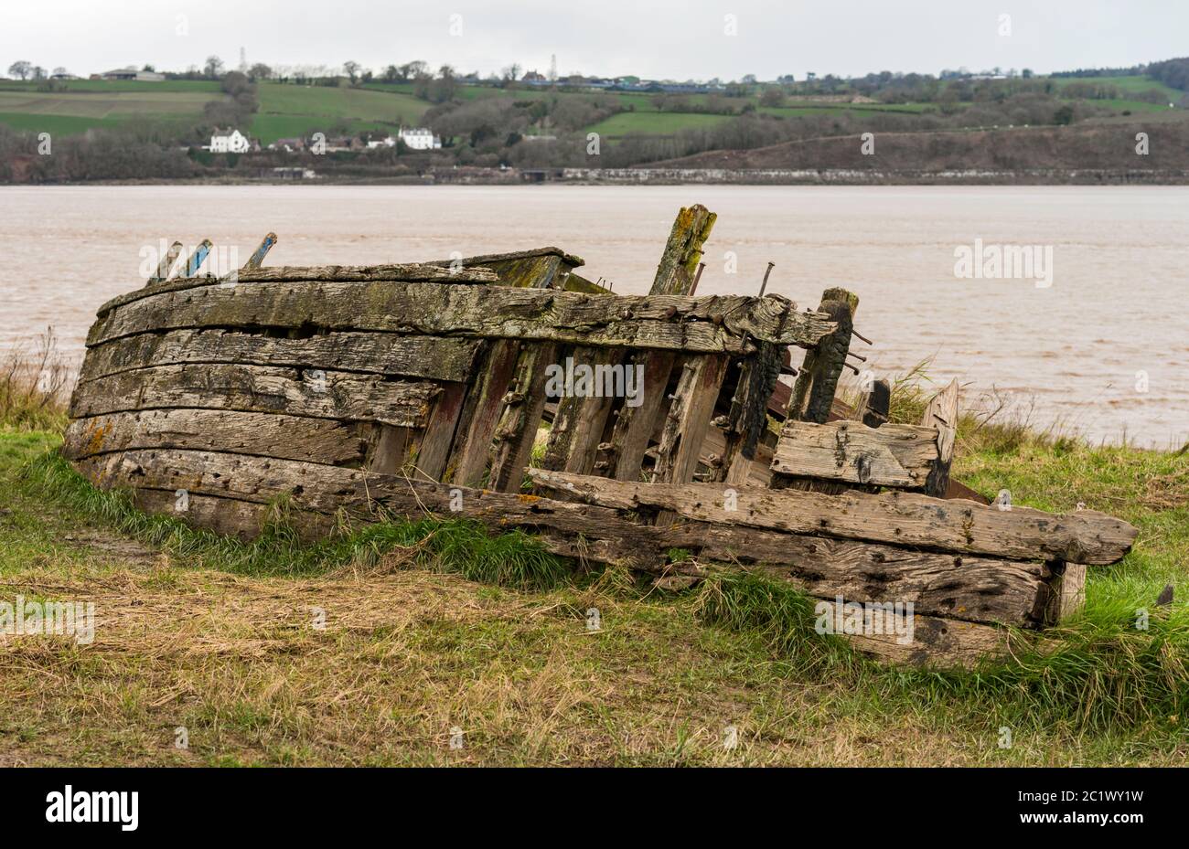 The barge 'Severn Collier' is among the boats beached beside the Severn ...