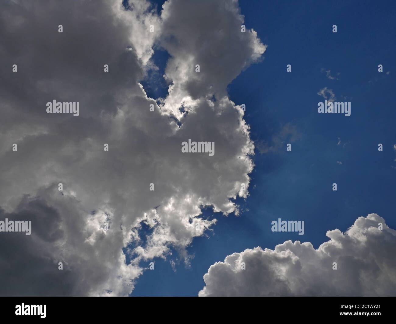 clouds blue sky sun ray, natural landscape Stock Photo - Alamy