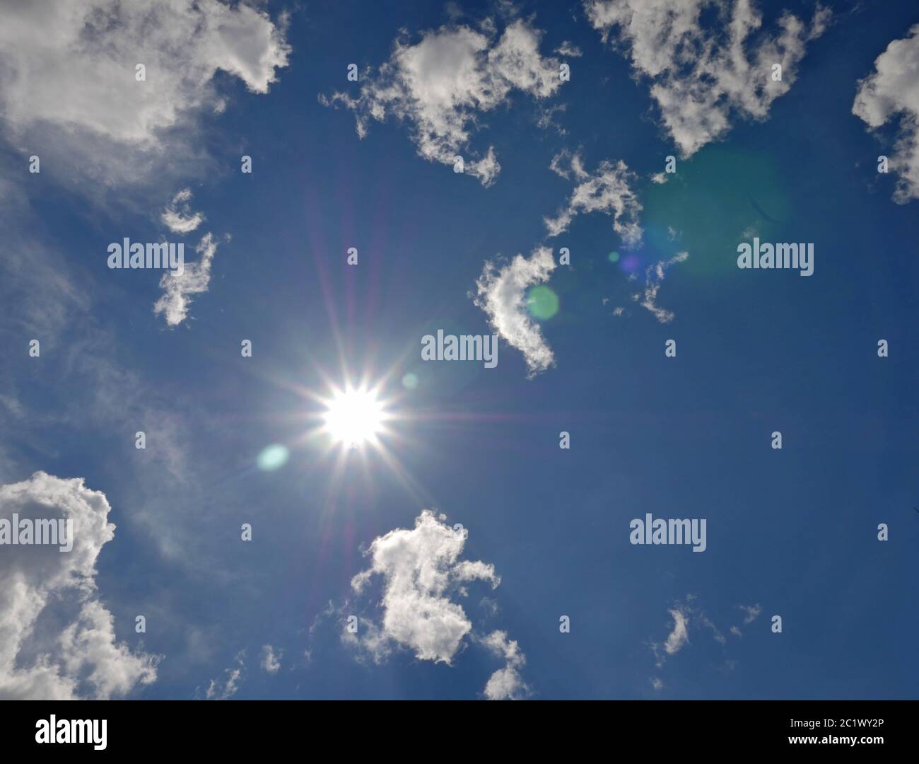 clouds blue sky sun ray, natural landscape Stock Photo - Alamy
