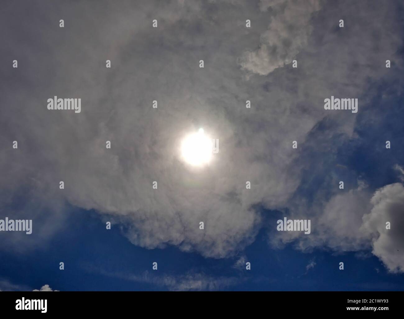 clouds blue sky sun ray, natural landscape Stock Photo - Alamy