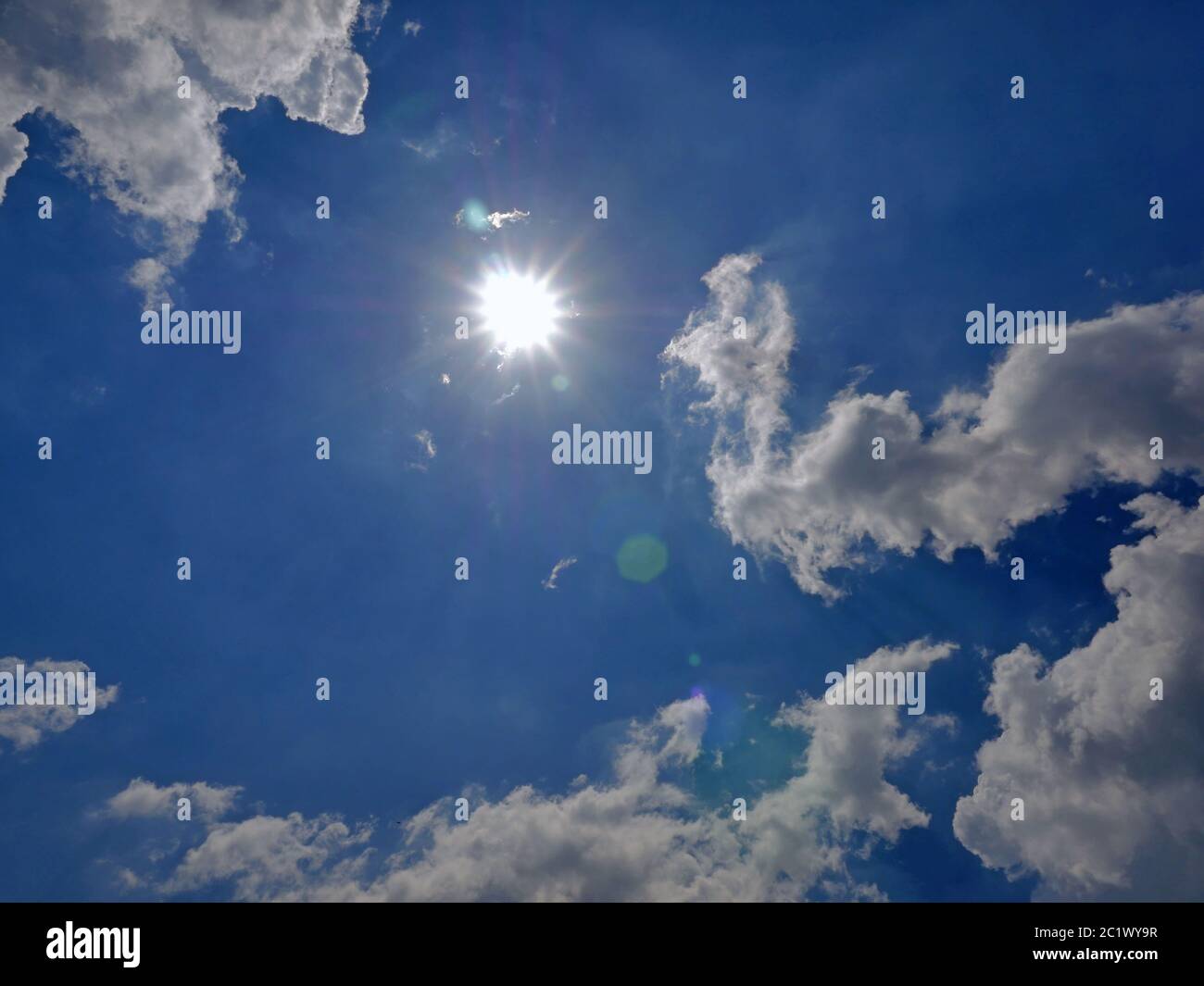clouds blue sky sun ray, natural landscape Stock Photo - Alamy