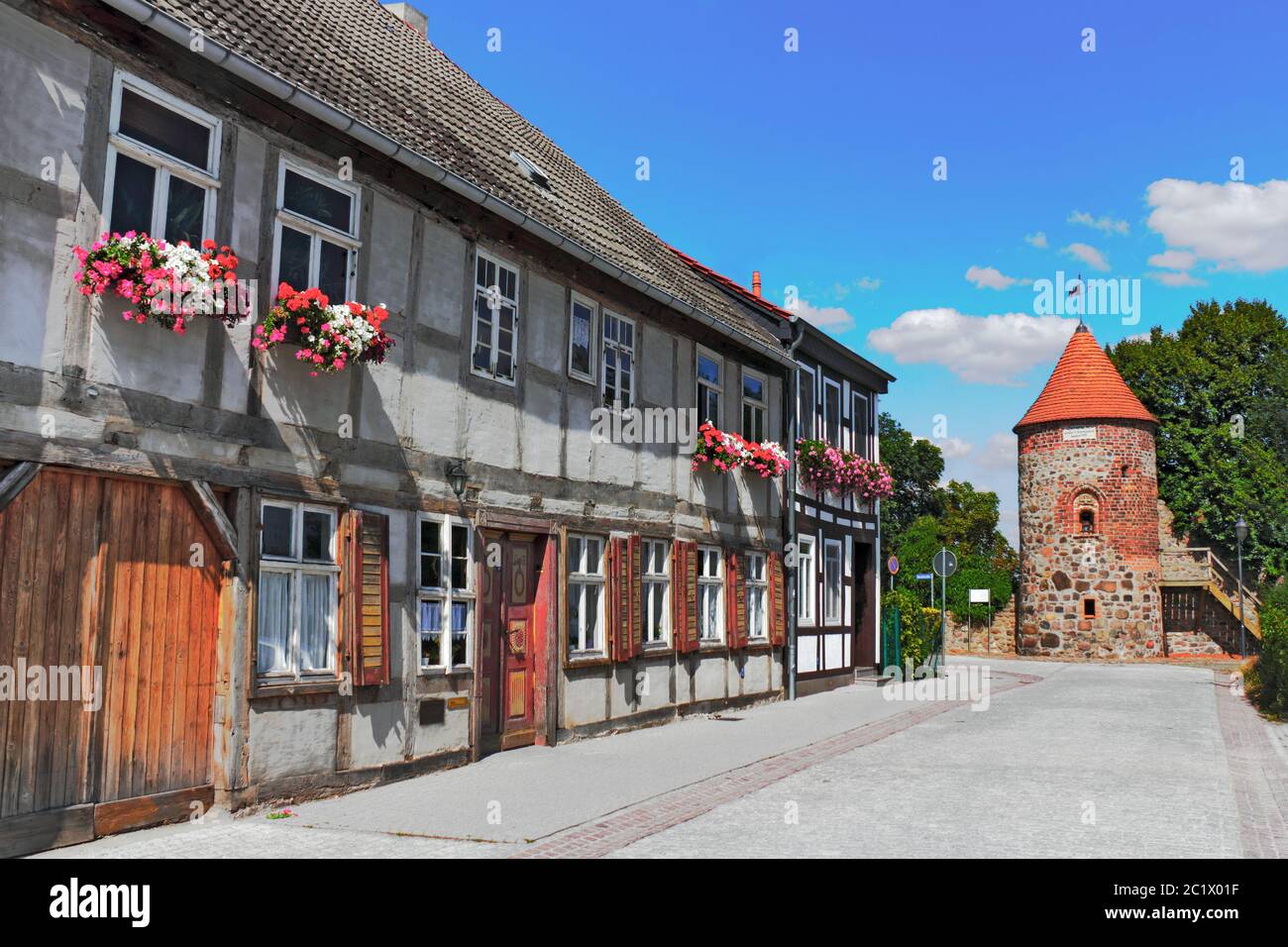 Half-timbered houses and witch tower Stock Photo - Alamy