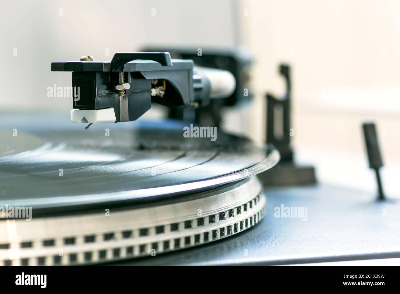 Close up on tone arm and needle of an old record player Stock Photo - Alamy