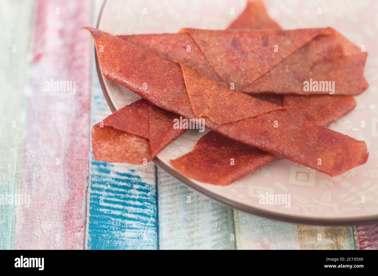 Sweet pure fruit pastille. Natural sweets from dried berries and fruits ...