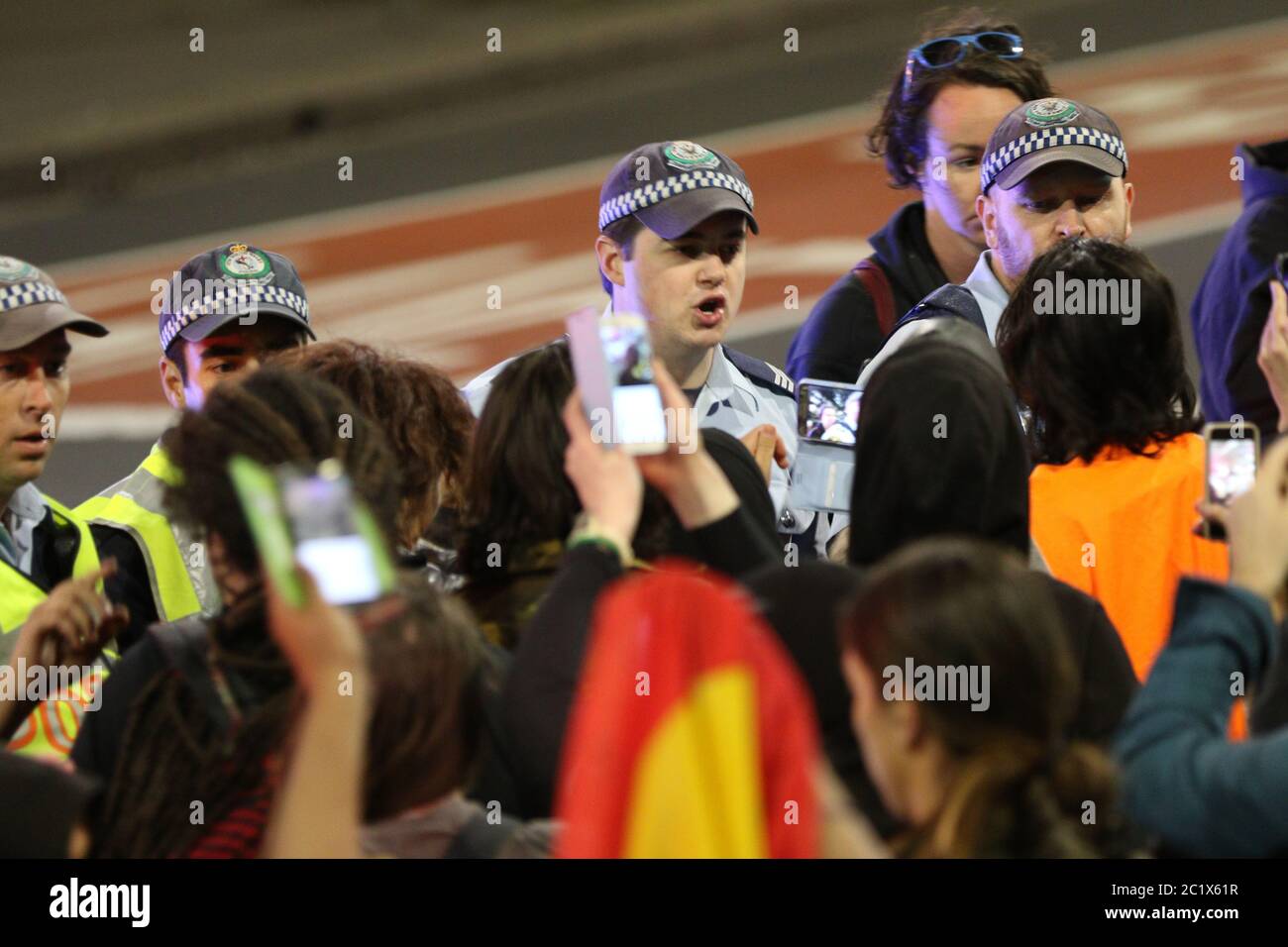 Pictured: Police push back protesters who had blocked the road during a ...