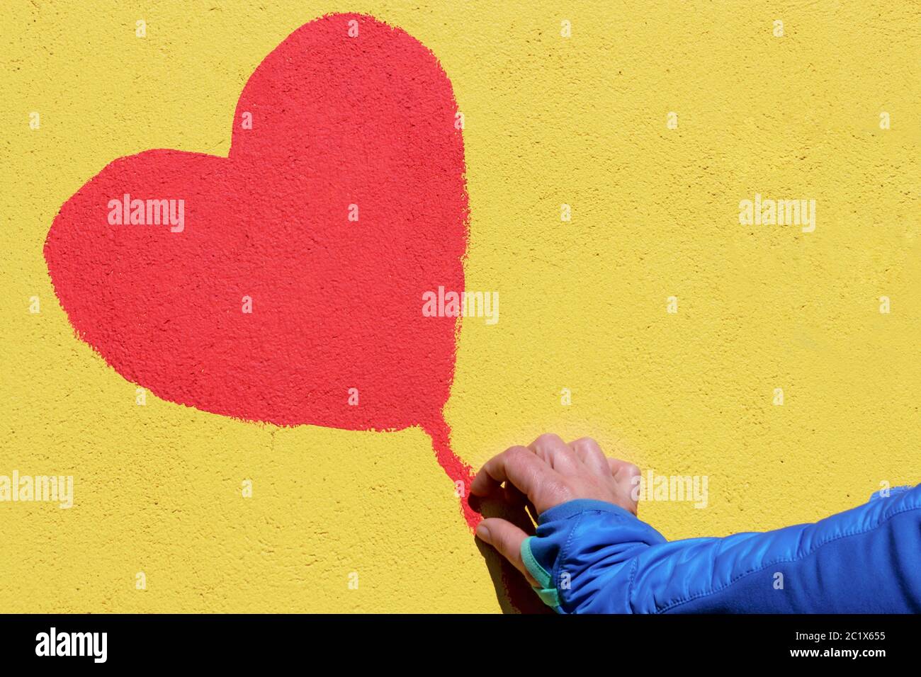 Hand with heart Stock Photo - Alamy