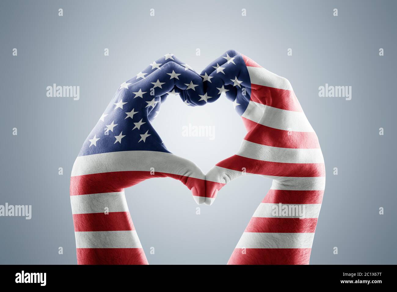 Two hands in the form of heart with Usa flag Stock Photo - Alamy
