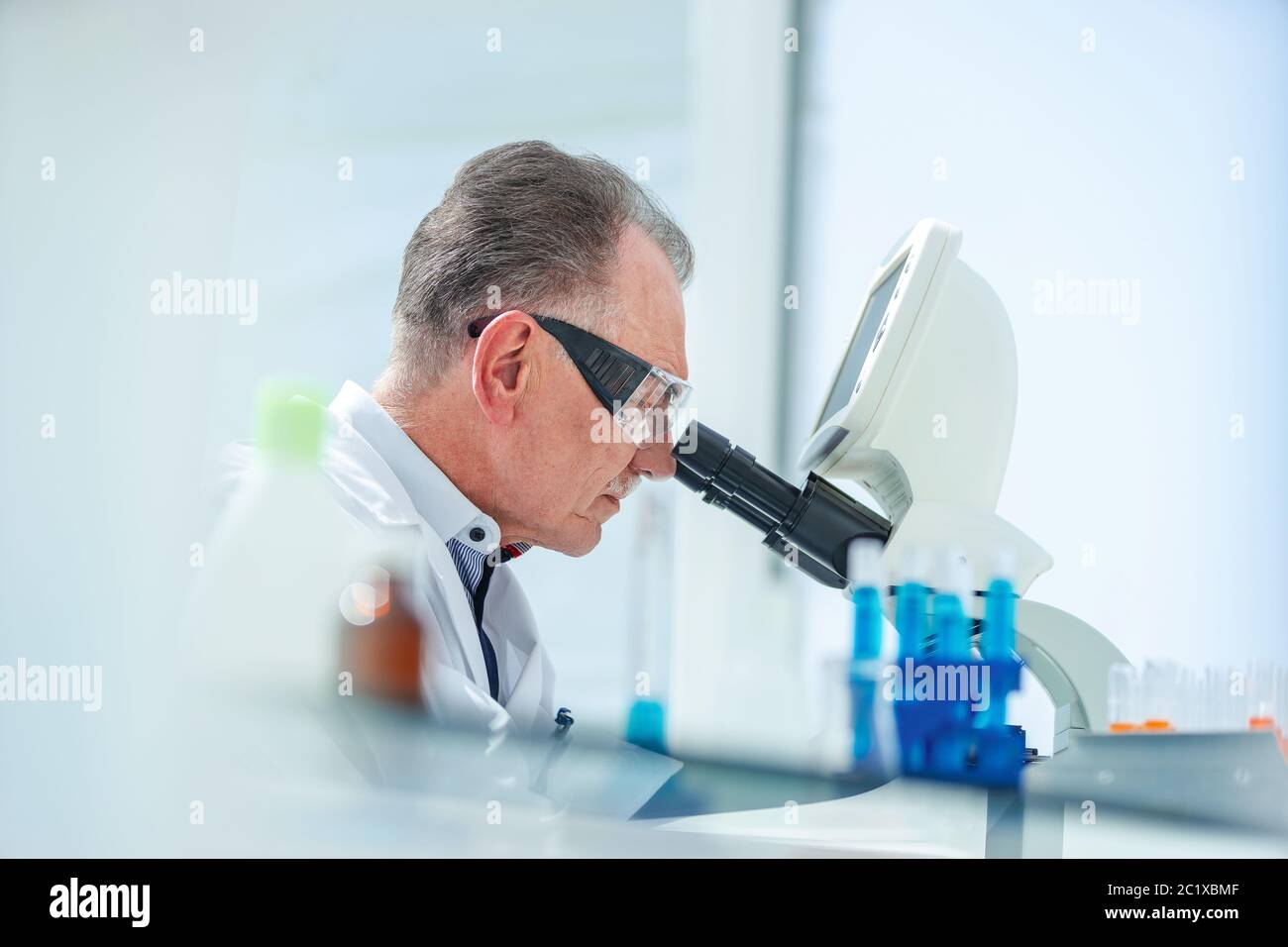 Looking Through Microscope High Resolution Stock Photography and Images ...