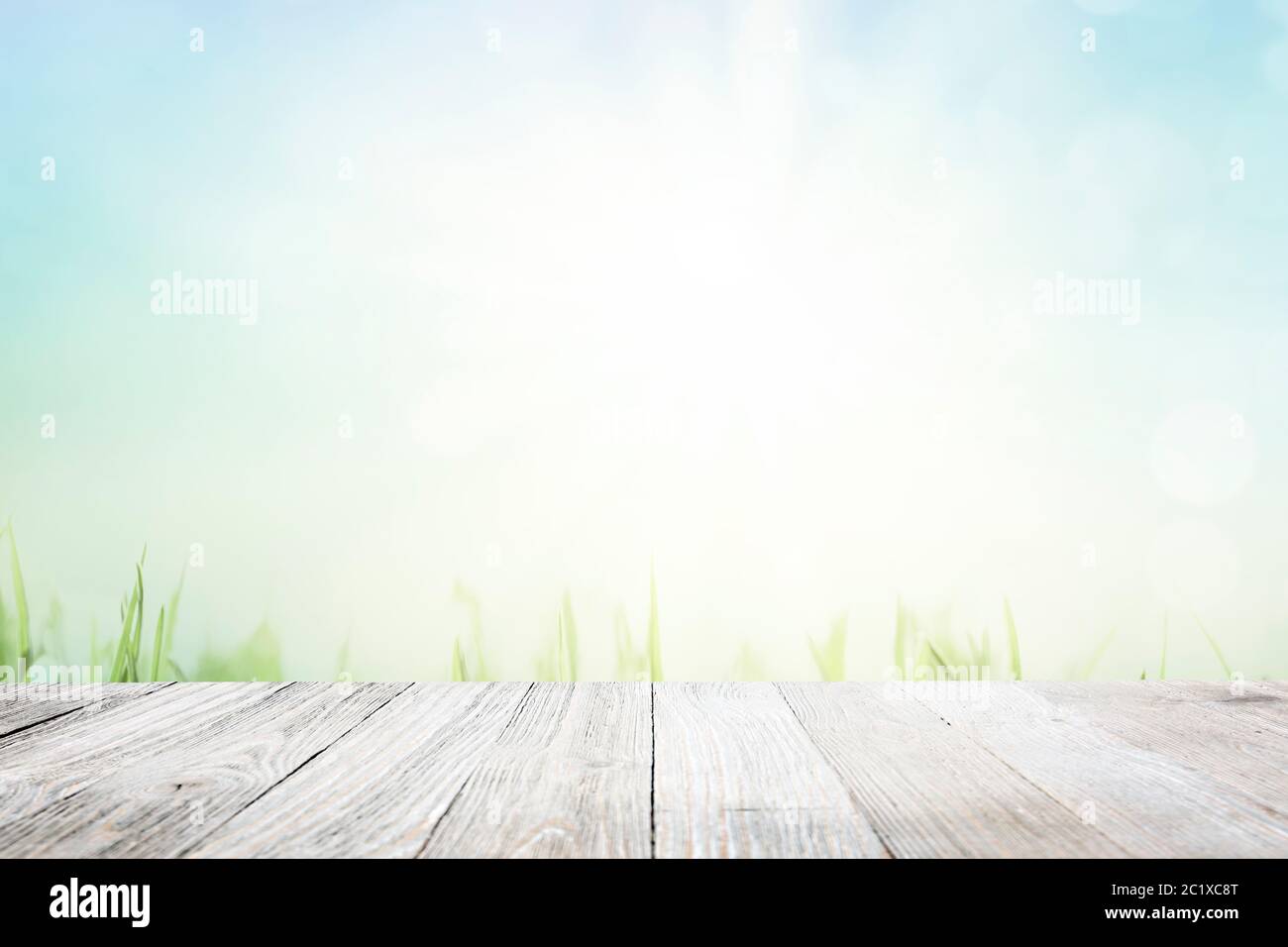Sunny blue sky over wooden deck background Stock Photo - Alamy