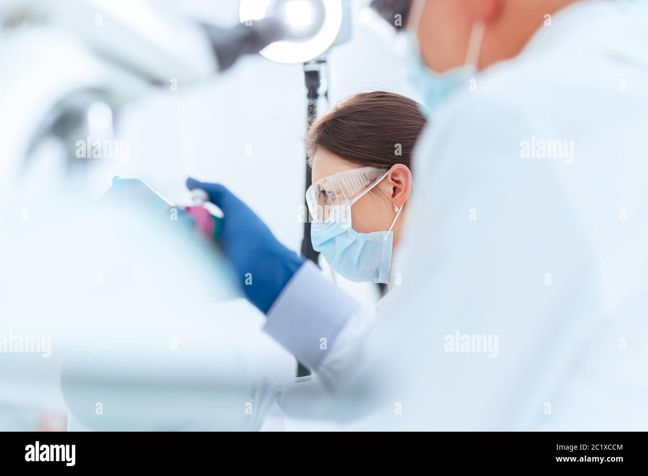 background image scientists conducting research in a medical laboratory ...